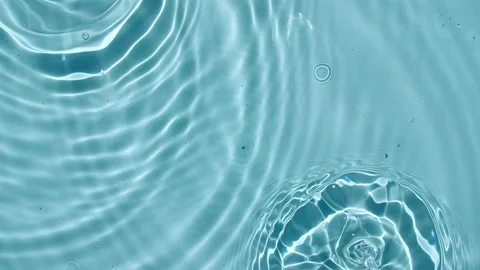 Top view slow motion of drop falls into ... | Stock Video | Pond5