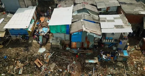 Top view of slum homes and kids | Stock Video | Pond5