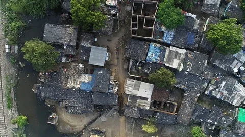 Top view of a slum next to the railway t... | Stock Video | Pond5