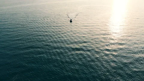 Top view of a speedboat floating through... | Stock Video | Pond5