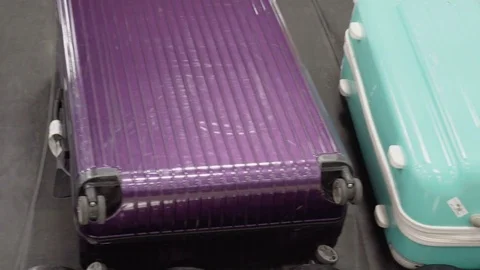 Top view of suitcases on moving luggage ... | Stock Video | Pond5