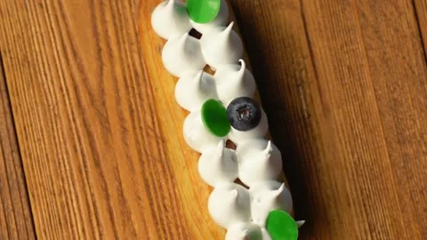 Top view of a sweet eclair rotating on a... | Stock Video | Pond5