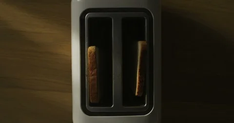 Top view of toaster bread popping out | Stock Video | Pond5