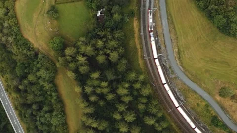 Top view of Train running on track in Sw... | Stock Video | Pond5
