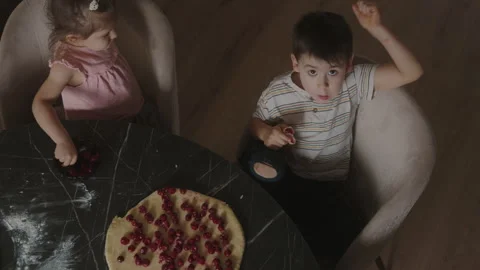 Top view of two children sitting in the ... | Stock Video | Pond5