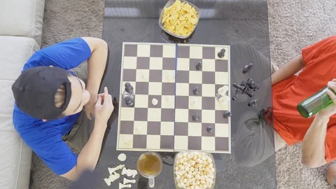 Top view of two teenage boys playing che... | Stock Video | Pond5