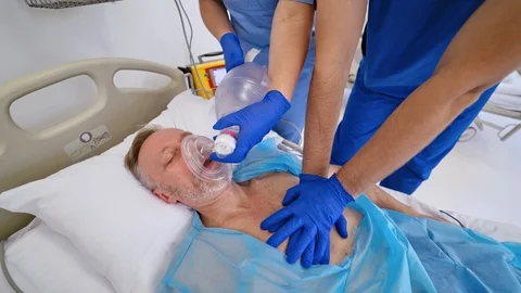 Top view of unconscious patient in emerg... | Stock Video | Pond5
