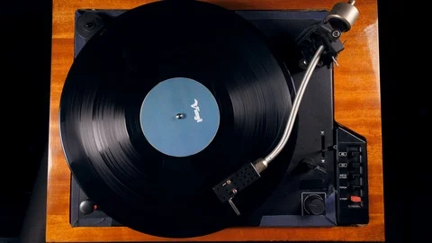 Top view of a vinyl recorder getting swi... | Stock Video | Pond5