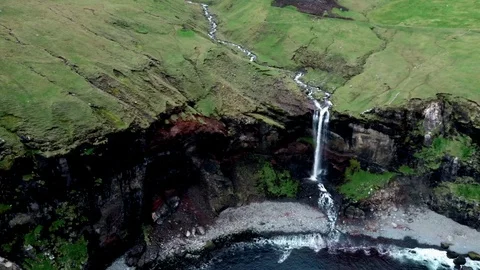 Top view of waterfall to the ocean | Stock Video | Pond5