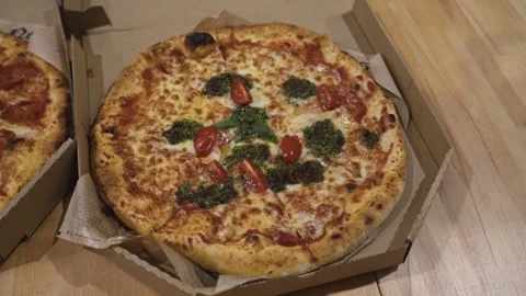 Top view of a whole vegetable pizza in a... | Stock Video | Pond5