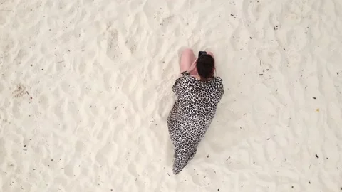 Top view of woman back view with phone i... | Stock Video | Pond5