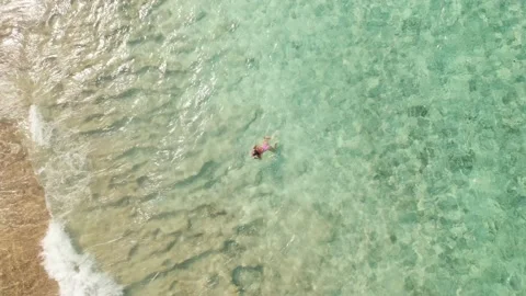 Top view of woman swimming in transparen... | Stock Video | Pond5