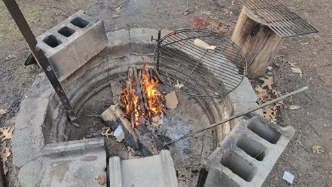 Top view of wood being burn in deep fire... | Stock Video | Pond5