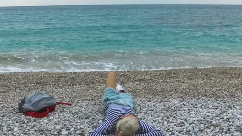 Top view of young beautiful woman relaxi... | Stock Video | Pond5