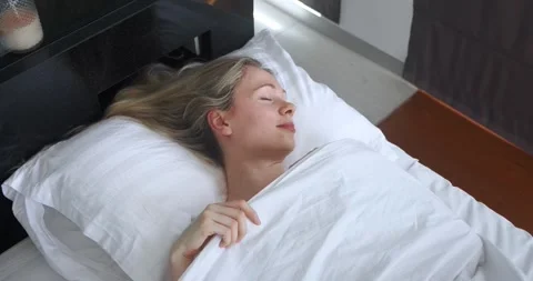 Top view young female 30s sleeping on th... | Stock Video | Pond5