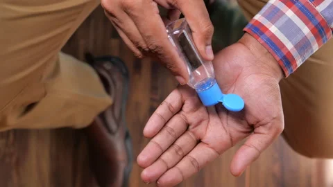 top view of young man sitting on sofa us... | Stock Video | Pond5