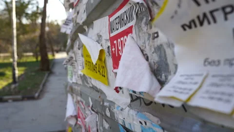 Torn advertisement tear off posters with... | Stock Video | Pond5