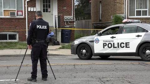 Toronto police at crime scene of drive b... | Stock Video | Pond5