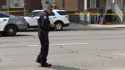 Toronto police at crime scene of drive b... | Stock Video | Pond5