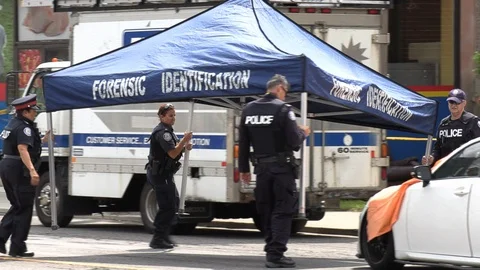 Toronto police at crime scene of drive b... | Stock Video | Pond5