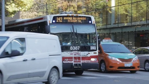 Toronto TTC City Bus Turning Right at Bu... | Stock Video | Pond5