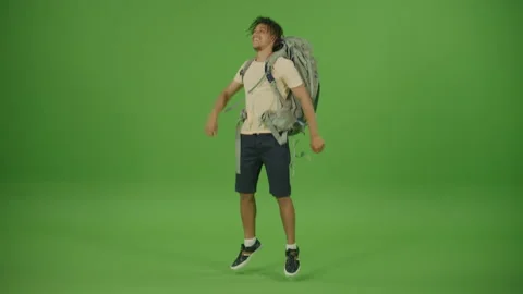 Tourist with Big Travel Backpack Funny D... | Stock Video | Pond5