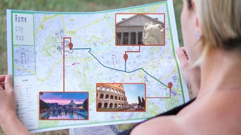 tourist holding rome interactive map | Stock Video | Pond5