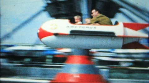 tourist ride rocket ships and merry-go-r... | Stock Video | Pond5