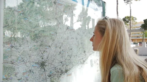 Person Looking At Map Stock Footage ~ Royalty Free Stock Videos | Pond5