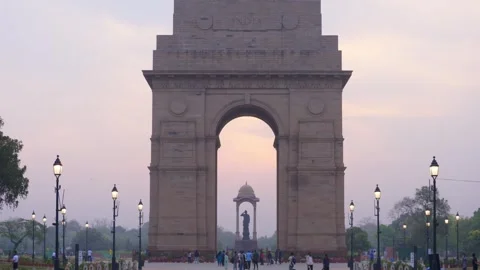 Tourists at Indian Gate at sunrise, Kart... | Stock Video | Pond5