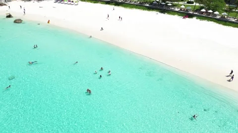 Tourists on the snow-white beach of Rach... | Stock Video | Pond5
