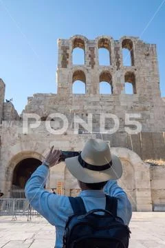 Tourists visit the Odeon of Herodes Atticus in Athens Stock Image ...