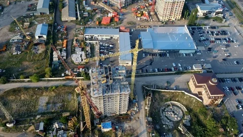 Tower crane on the background of constru... | Stock Video | Pond5