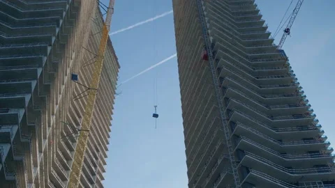 Tower lifting crane lift up construction... | Stock Video | Pond5