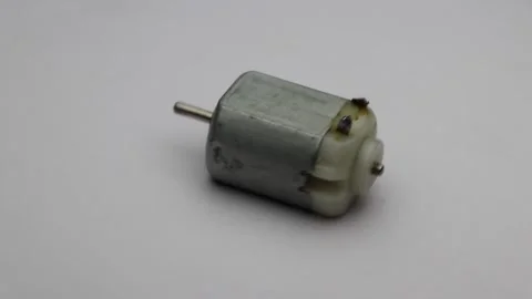 Toy DC Motor on white background | Stock Video | Pond5