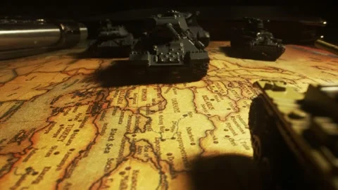 Toy tanks on the map. Military operation... | Stock Video | Pond5