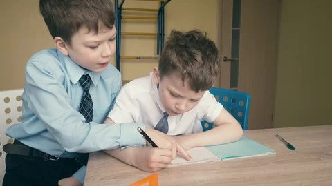 Tracking: Pupils do homework, write numb... | Stock Video | Pond5