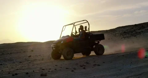 Tracking shot of buggy car moving throug... | Stock Video | Pond5