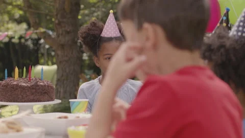 Tracking Shot of Children Sitting at Tab... | Stock Video | Pond5