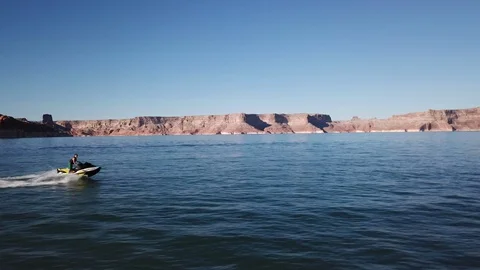 Tracking shot of a jet ski driving fast ... | Stock Video | Pond5