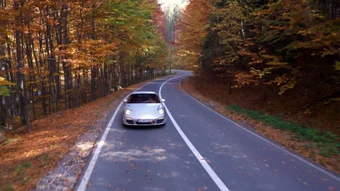 Tracking shot of a Porsche 911 Carrera 4... | Stock Video | Pond5