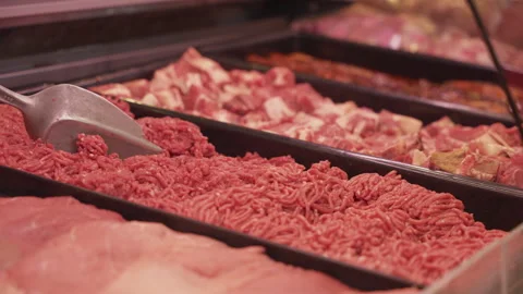 Tracking shot of red meat cuts and mince... | Stock Video | Pond5