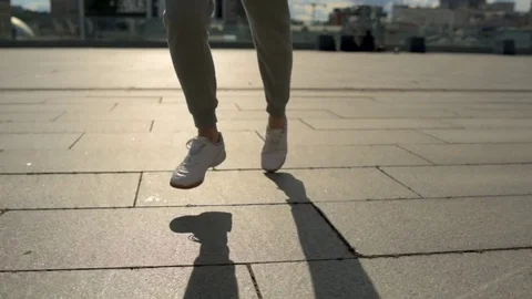 Tracking shot of a sporty man running | Stock Video | Pond5