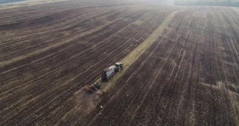 tractor makes organic fertilizer on the ... | Stock Video | Pond5