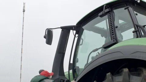 Tractor operators are getting into moder... | Stock Video | Pond5