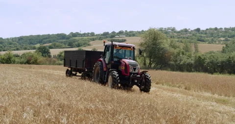 A tractor pulling a semi-trailer through... | Stock Video | Pond5