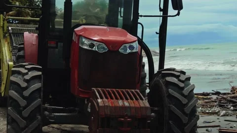 Tractor technic for cleaning the sea bea... | Stock Video | Pond5