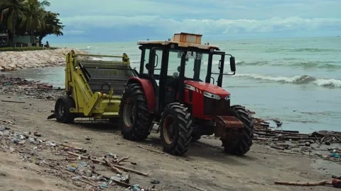 Tractor technic for cleaning the sea bea... | Stock Video | Pond5
