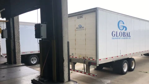 Tractor Trailer Backing in To Loading Do... | Stock Video | Pond5