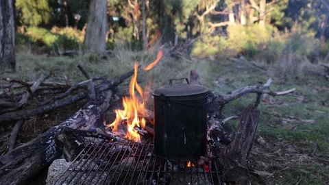 A traditional Australian billy cooking o... | Stock Video | Pond5